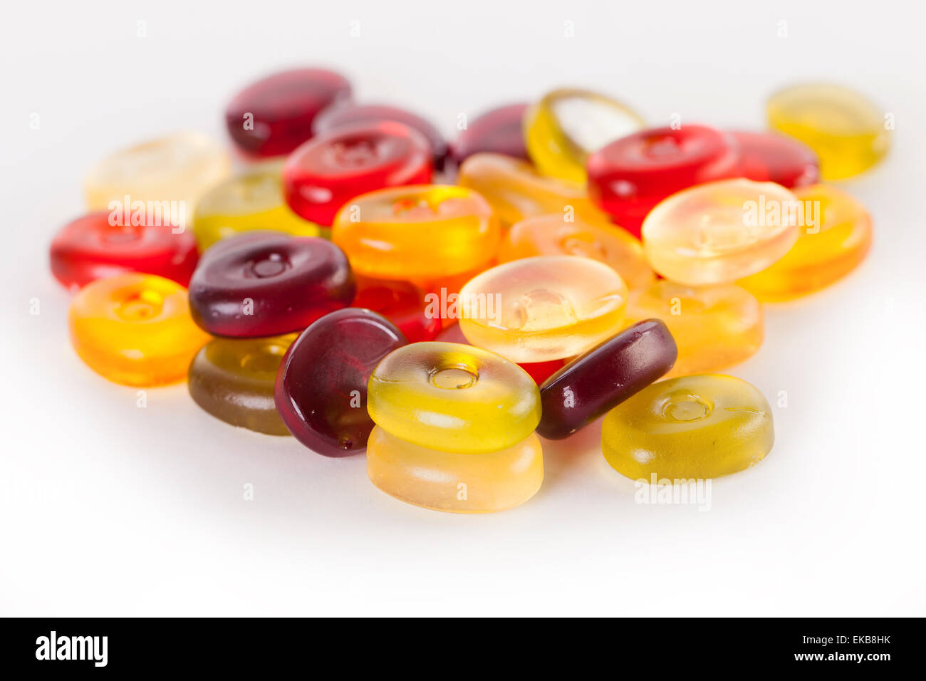 Bright candies isolated on a white background Stock Photo - Alamy