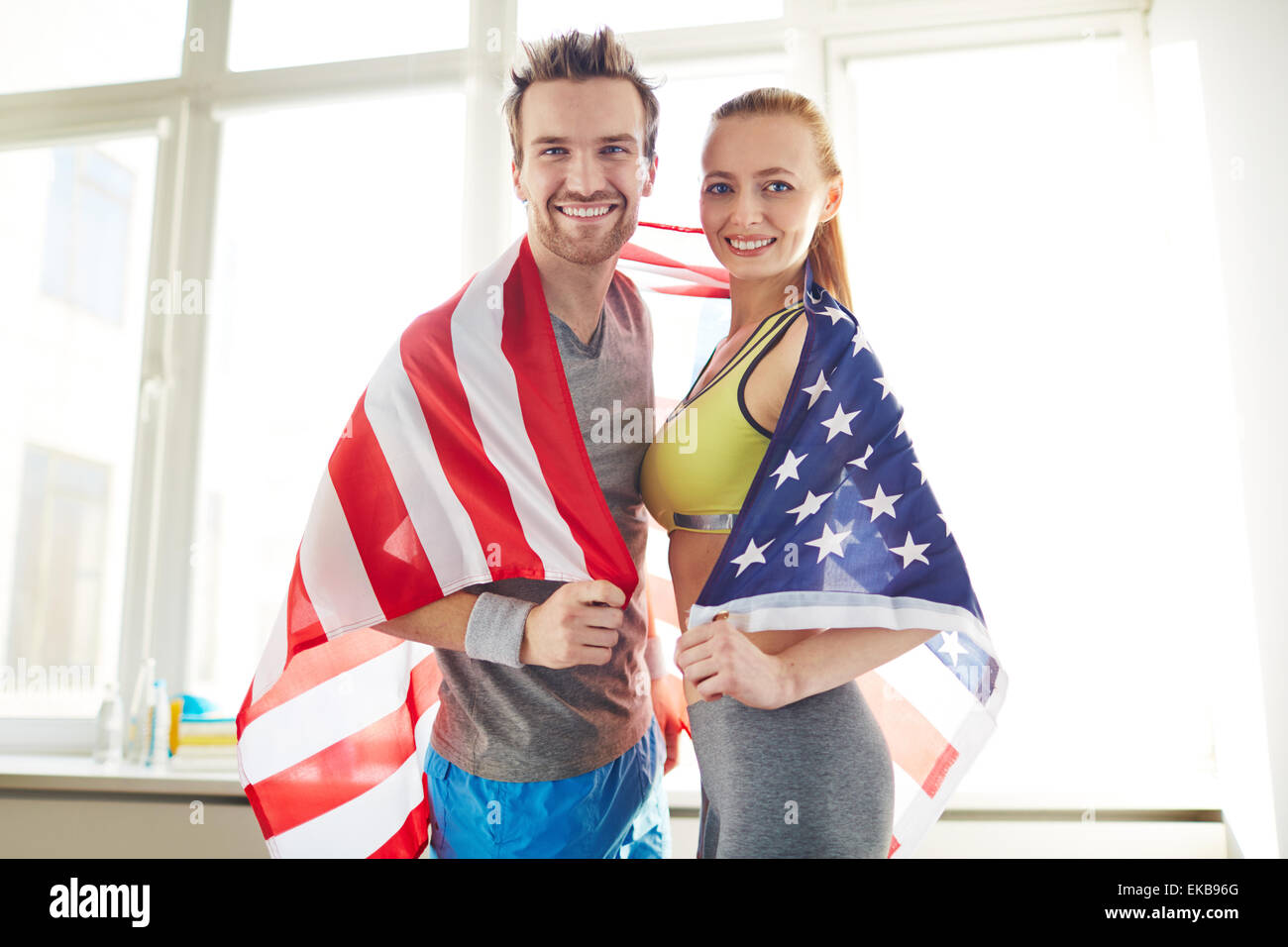 Couple wrapped in american flag hi-res stock photography and images - Alamy