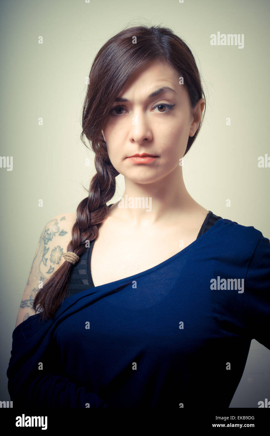 portrait of beautiful girl with long hair and blue sweater Stock Photo ...