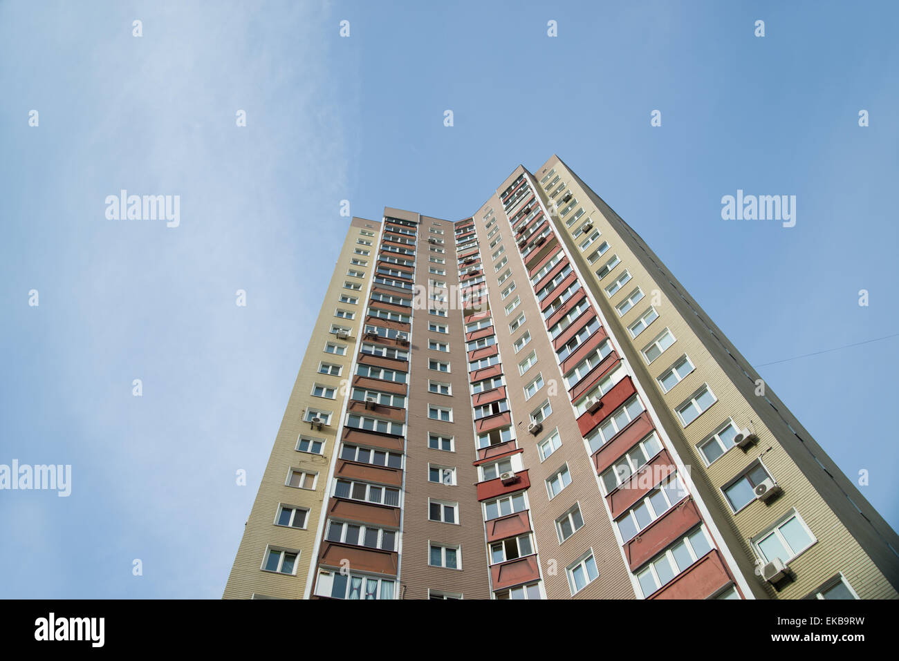 High-rise apartment building on sky background Stock Photo - Alamy