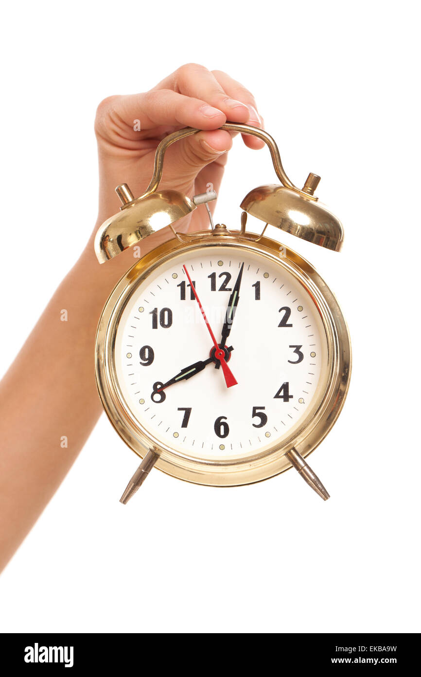 Alarm clock in woman's hand Stock Photo - Alamy