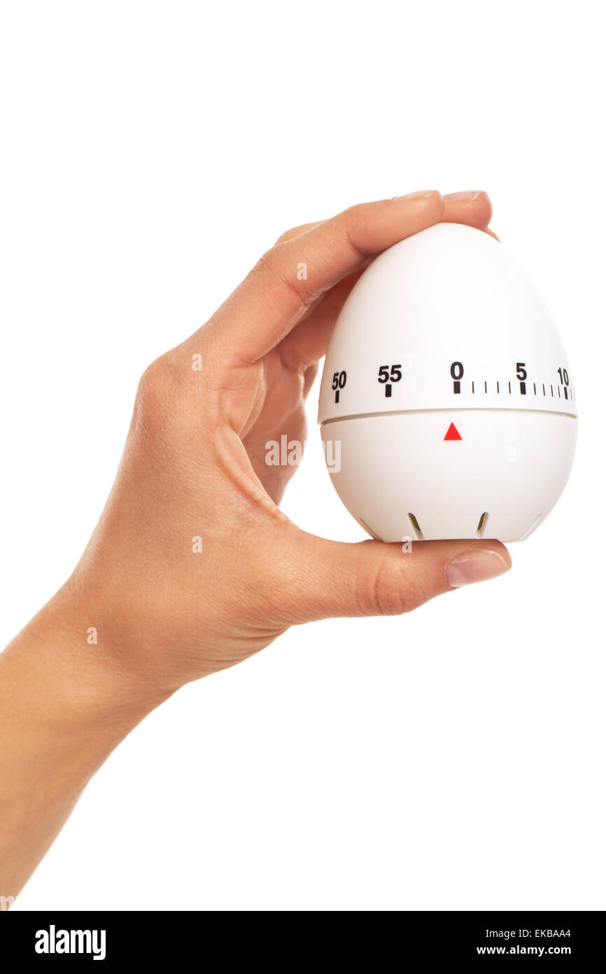 Kitchen timer in woman's hand Stock Photo - Alamy