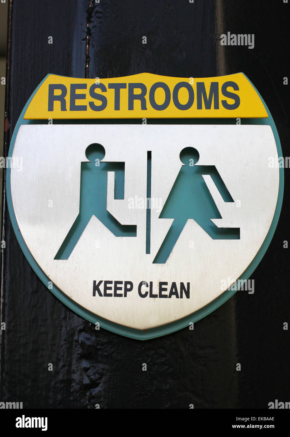 Sign of public restroom silver metallic plate Stock Photo - Alamy