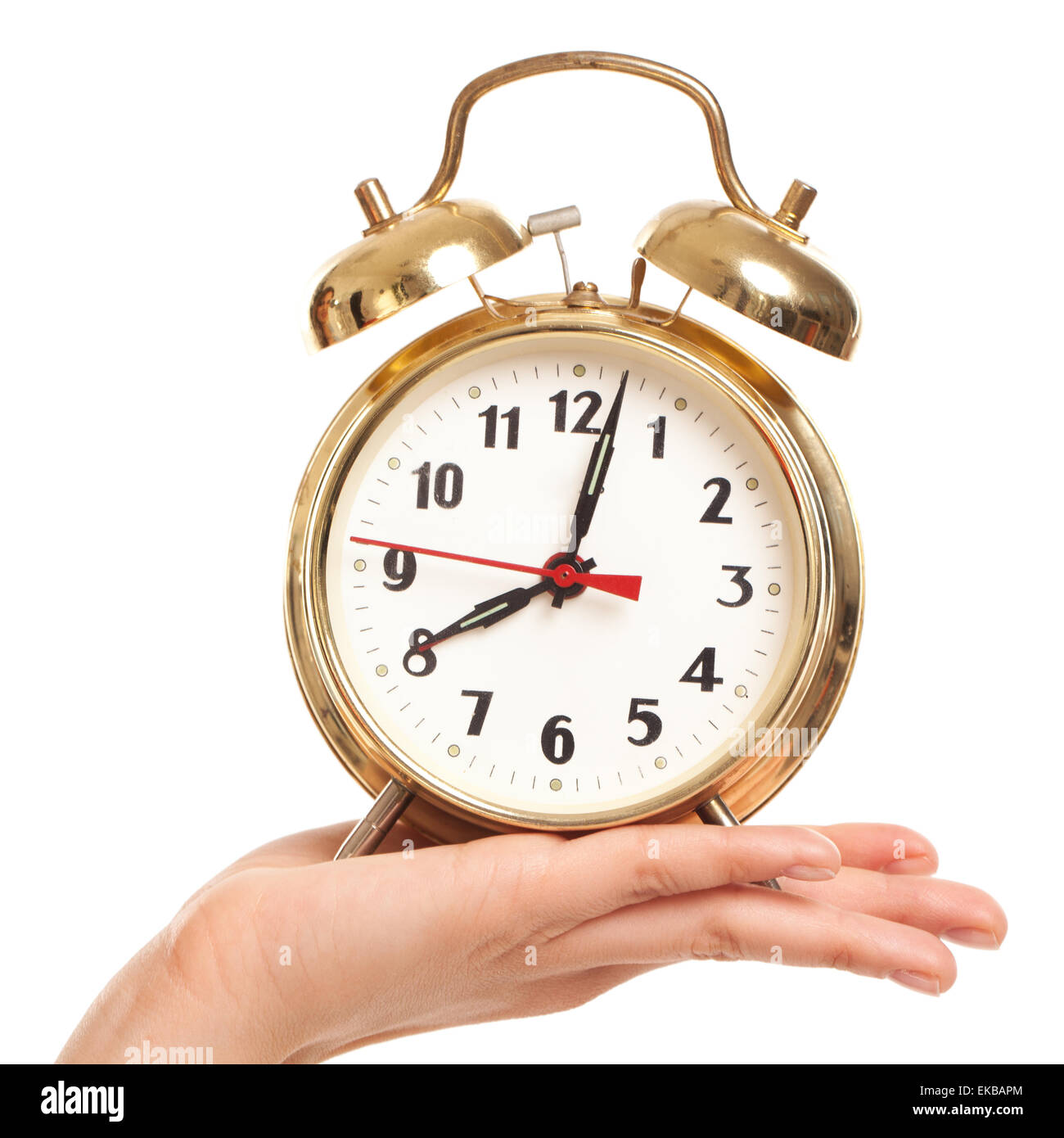 Alarm clock in woman's hand Stock Photo - Alamy