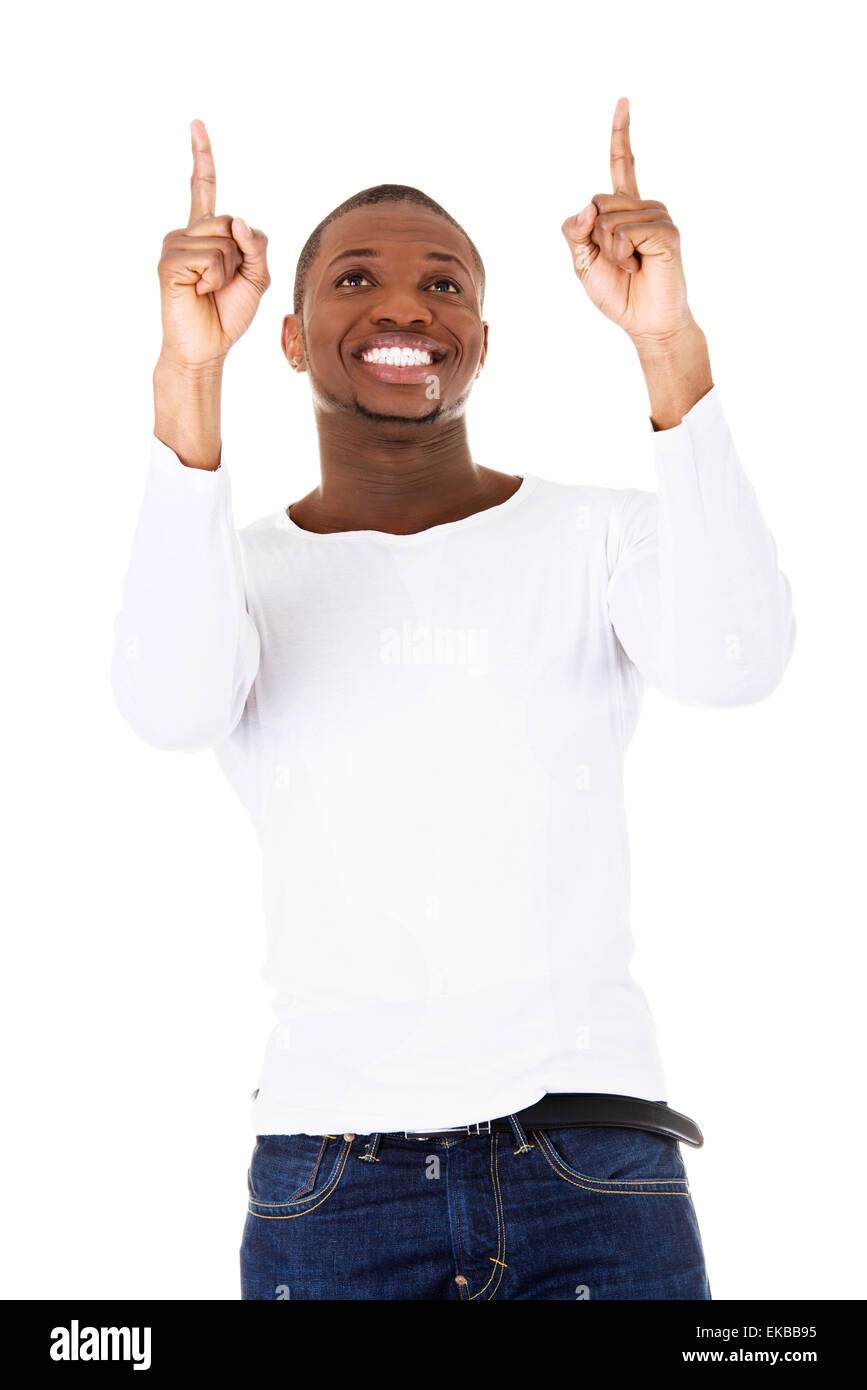 Happy young man pointing at something Stock Photo - Alamy