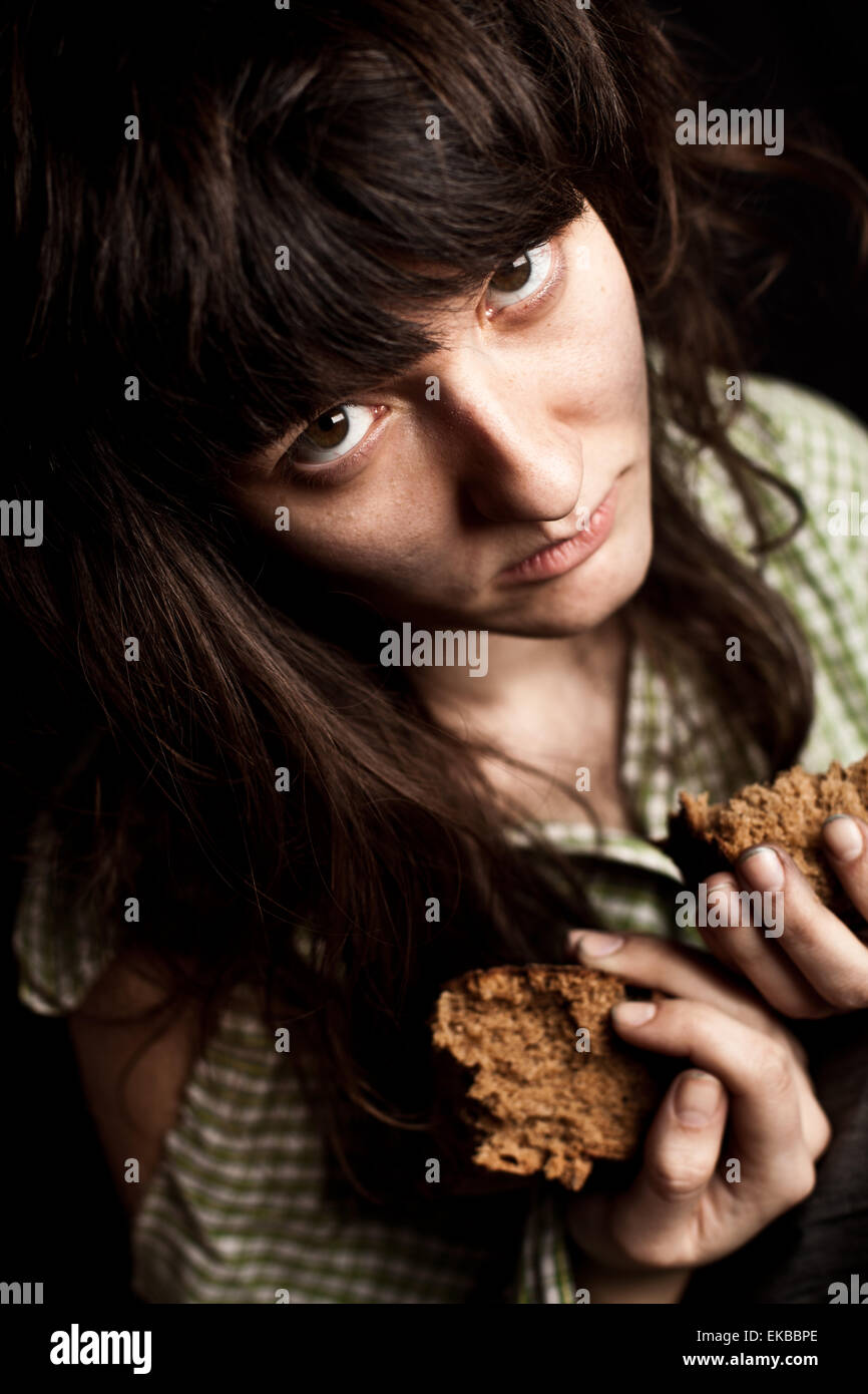 Woman hand bread poor hi-res stock photography and images - Alamy