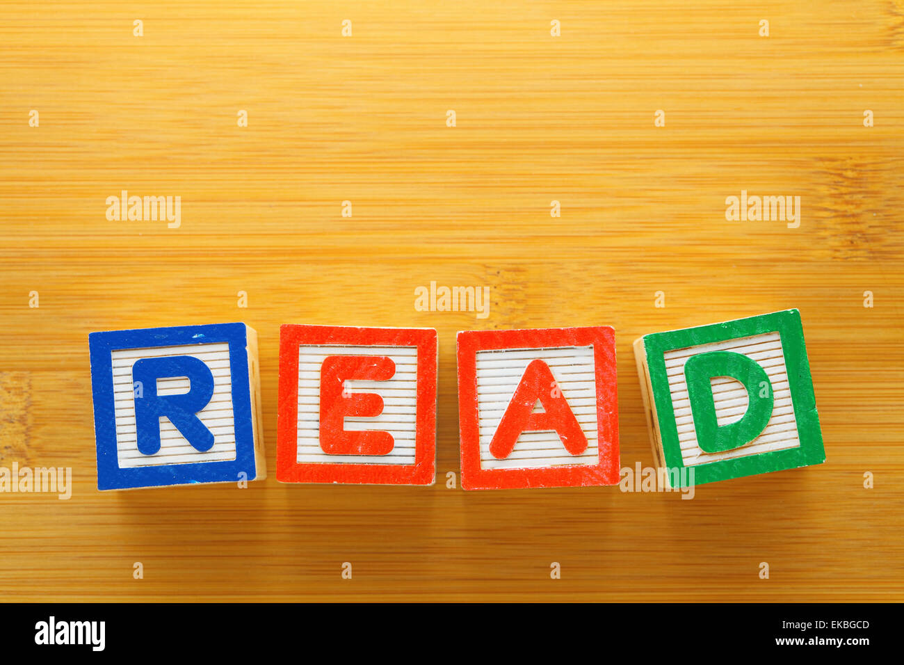 Alphabet Block spell the word READ Stock Photo - Alamy