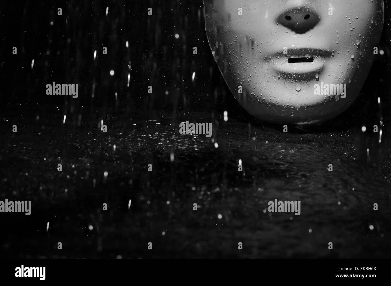 Mask and rain Stock Photo - Alamy
