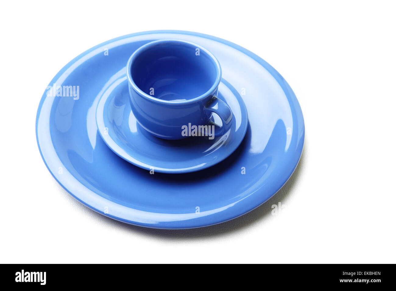 Blue plates and teacup Stock Photo - Alamy