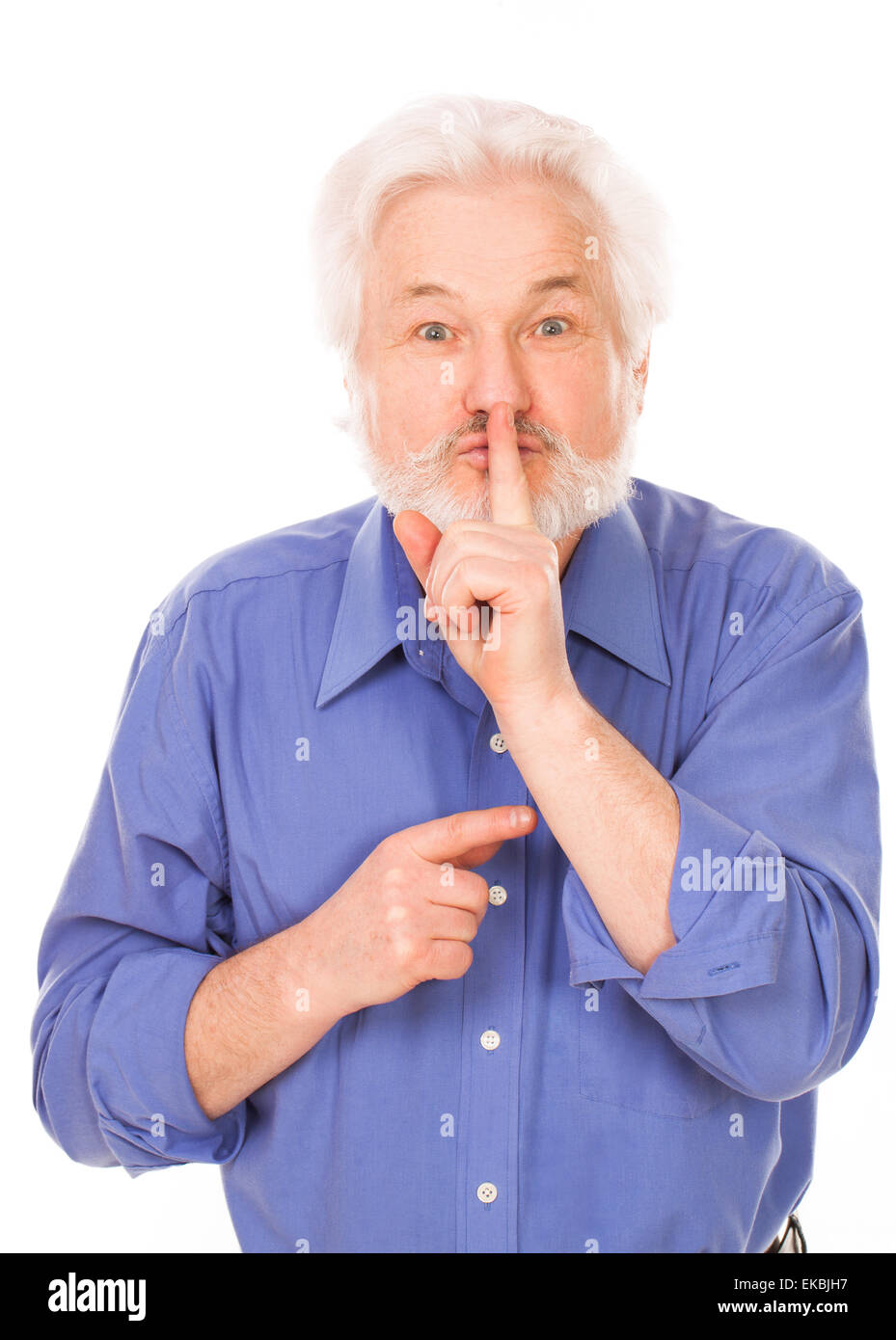 Elderly man with finger on lips Stock Photo - Alamy
