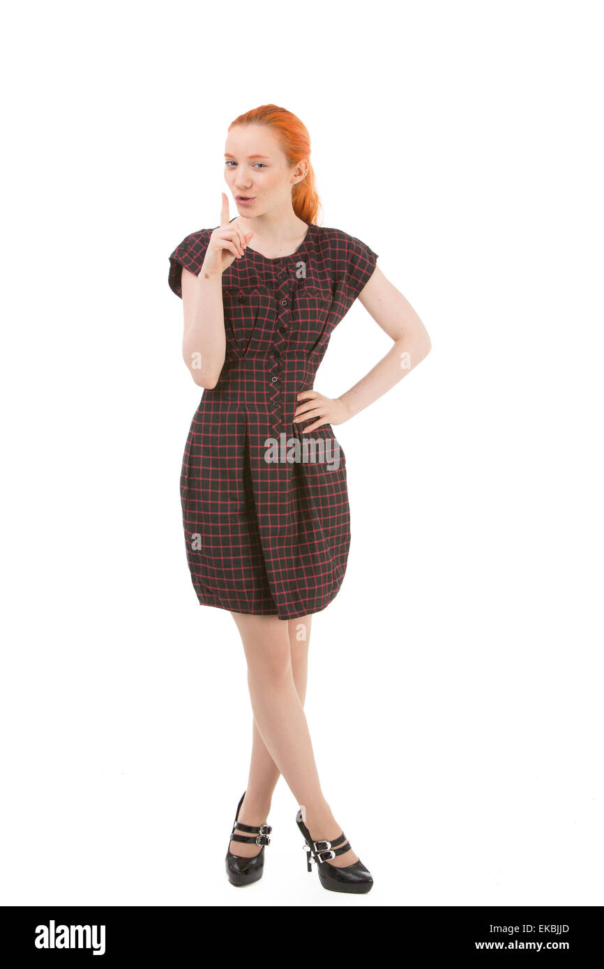 Woman making a hushing gesture Stock Photo - Alamy