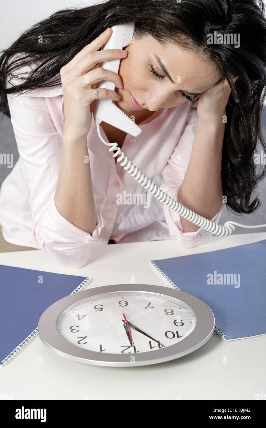 Clock watching at work hi-res stock photography and images - Alamy