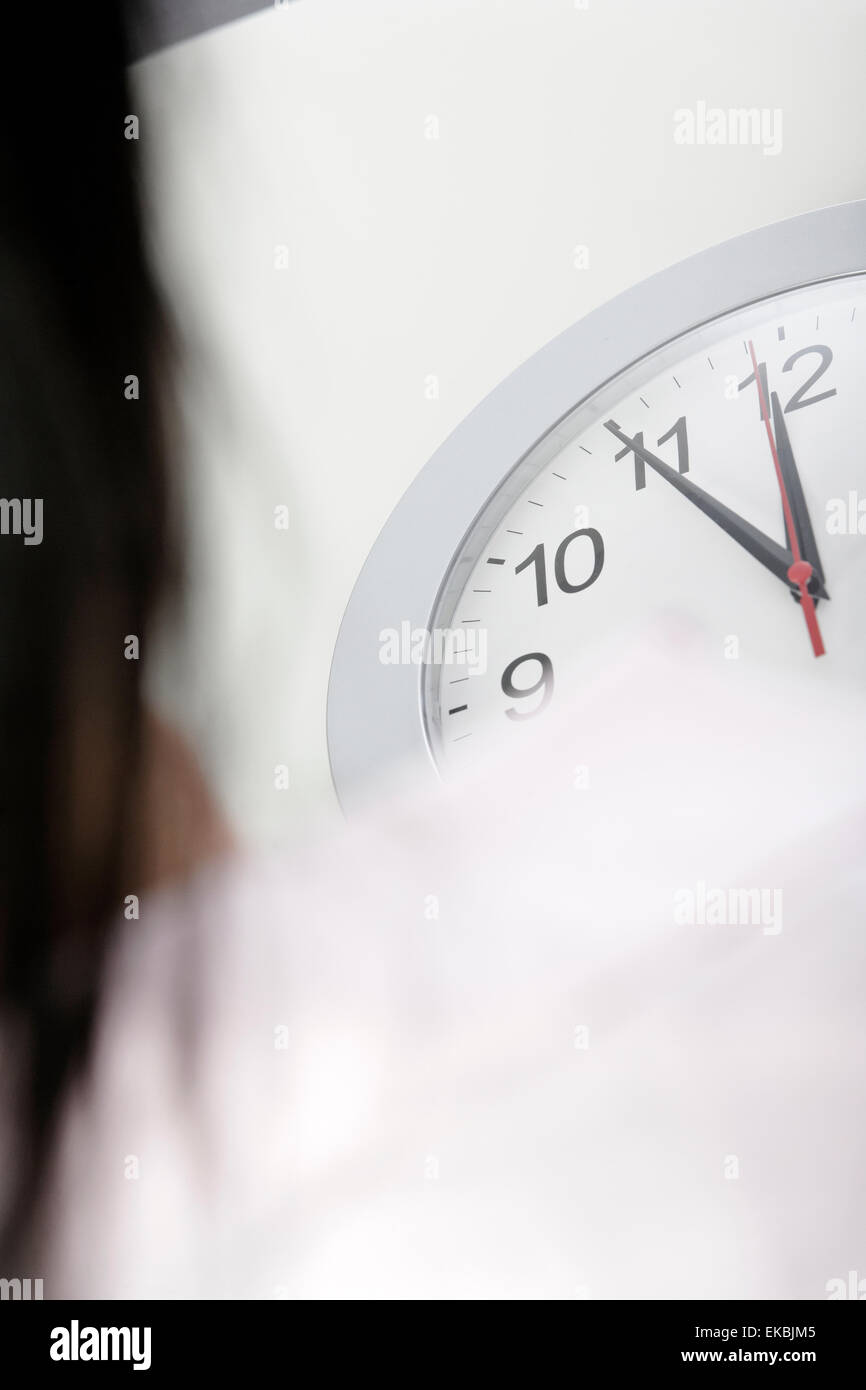 Woman time clock busy hi-res stock photography and images - Alamy