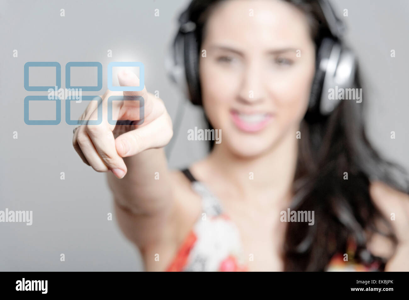 Woman choosing song from playlist Stock Photo - Alamy