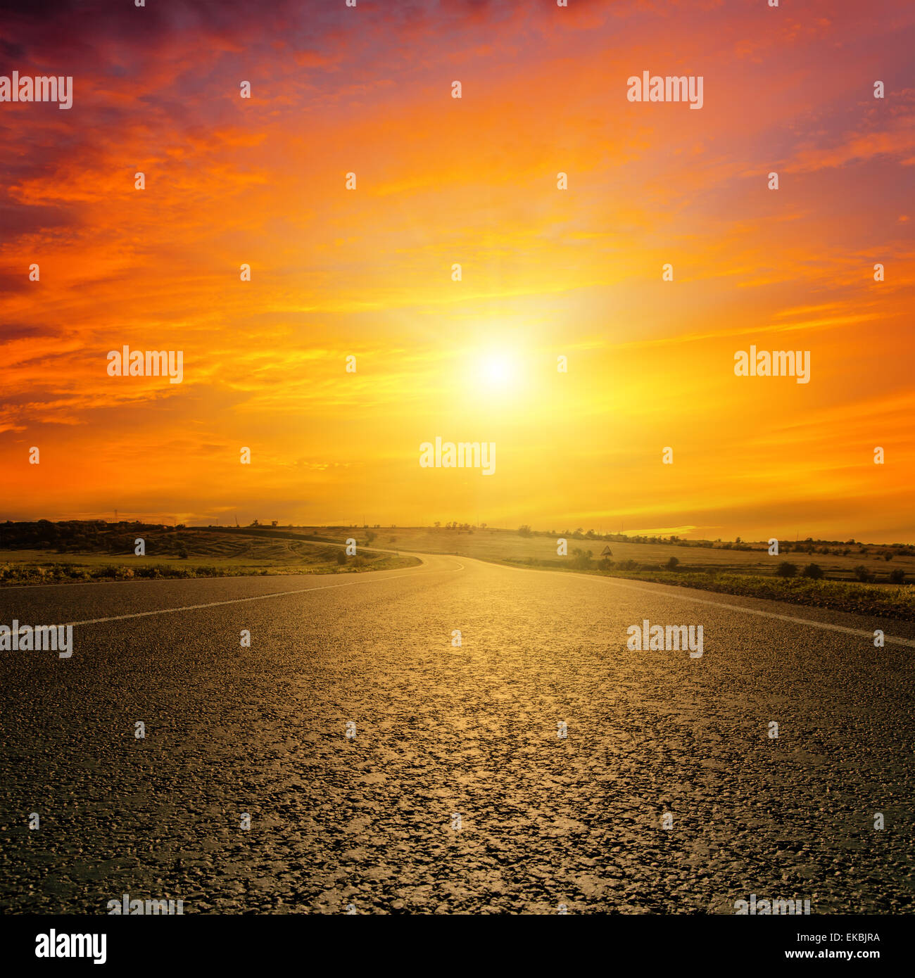 red sunset over road Stock Photo - Alamy