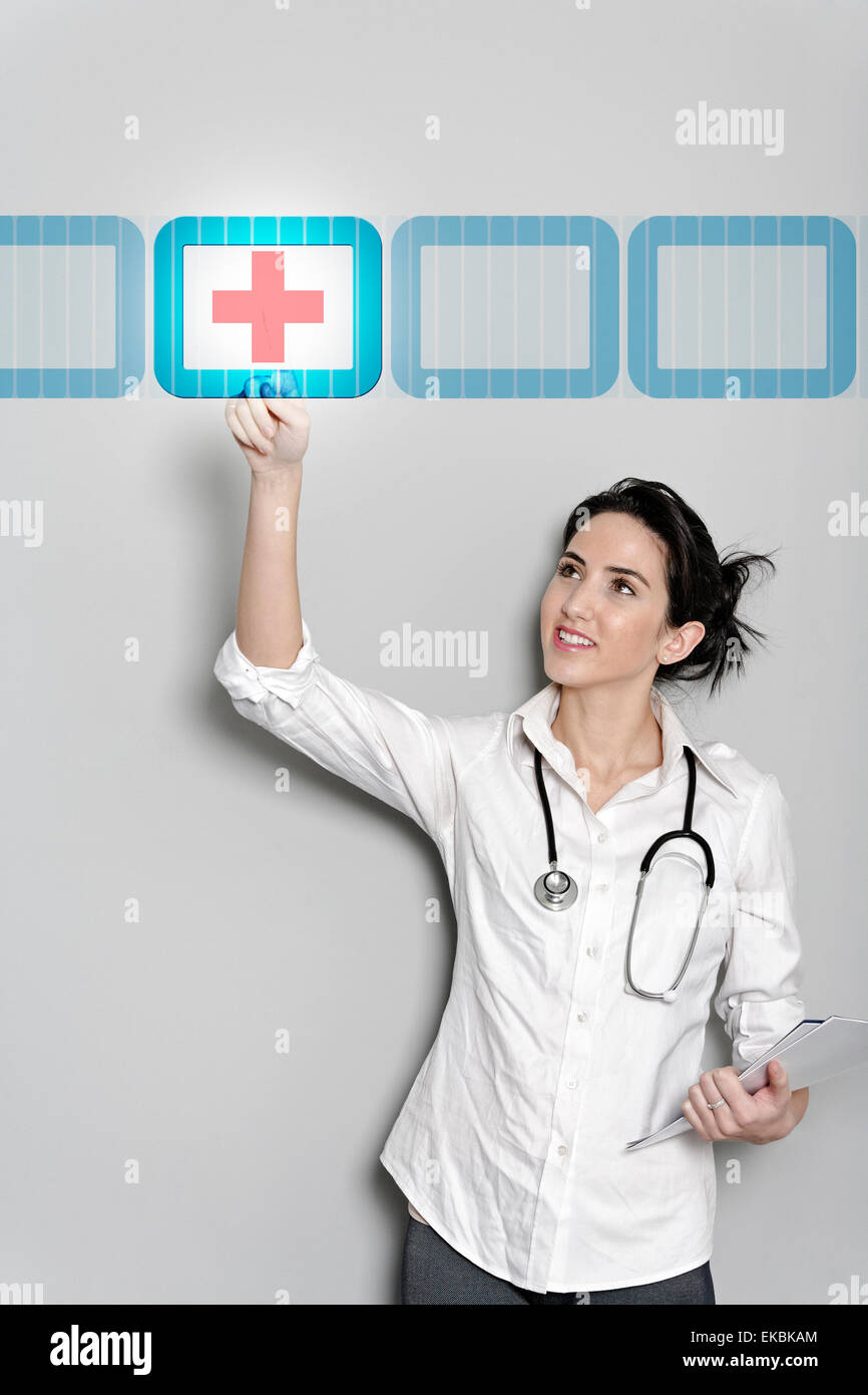 Stethoscope red cross sign hi-res stock photography and images - Alamy