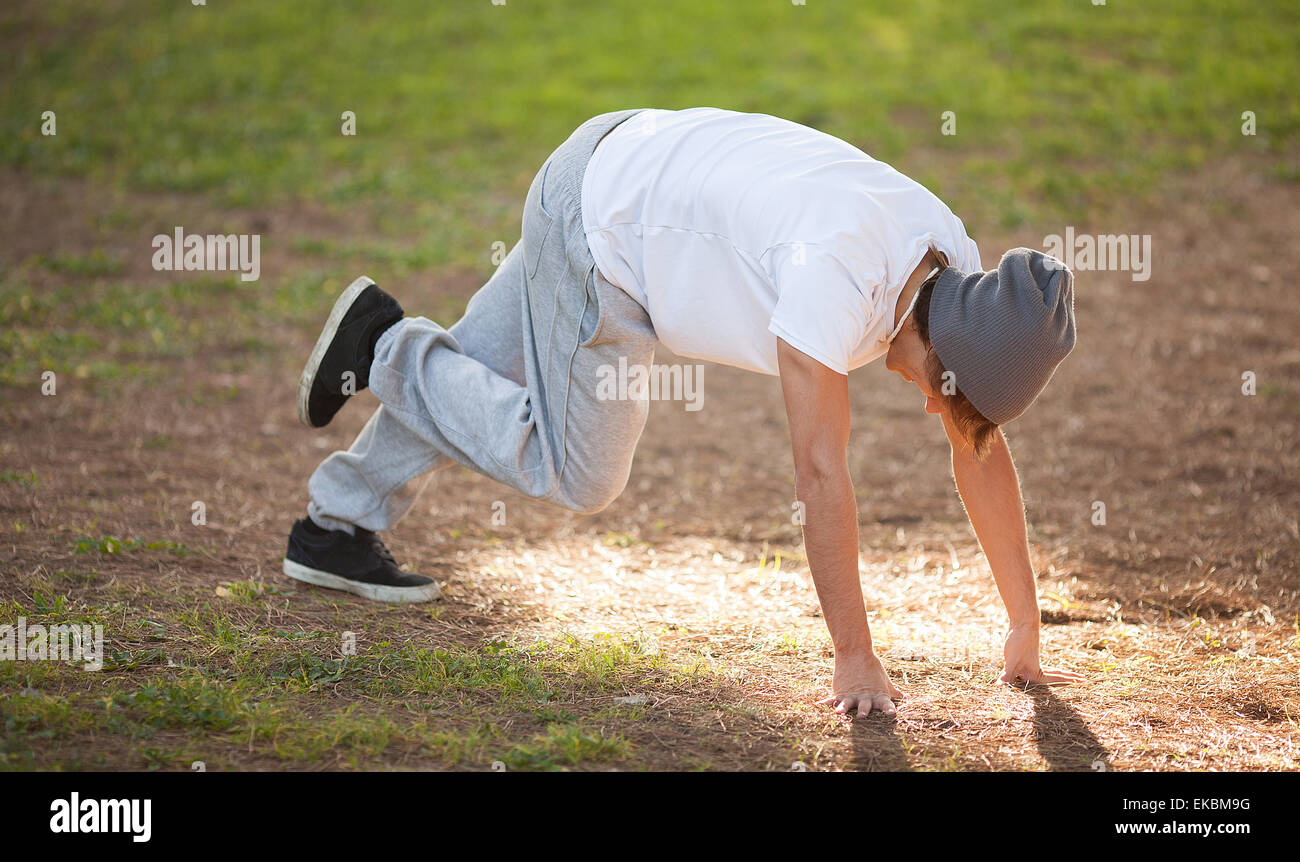 young man portrait stretching after jogging Stock Photo - Alamy