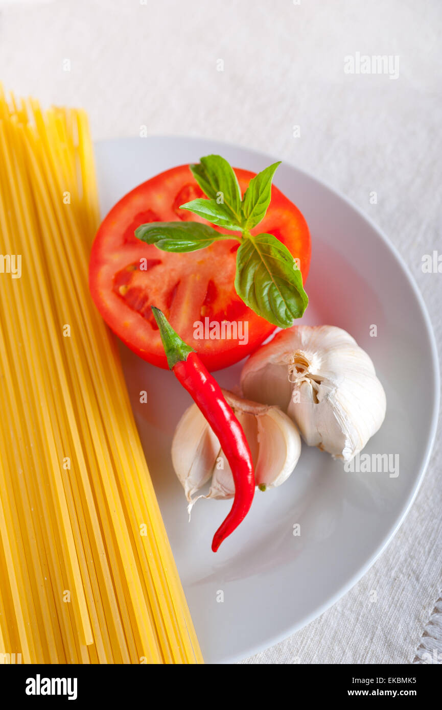 Italian spaghetti pasta tomato ingredients Stock Photo - Alamy