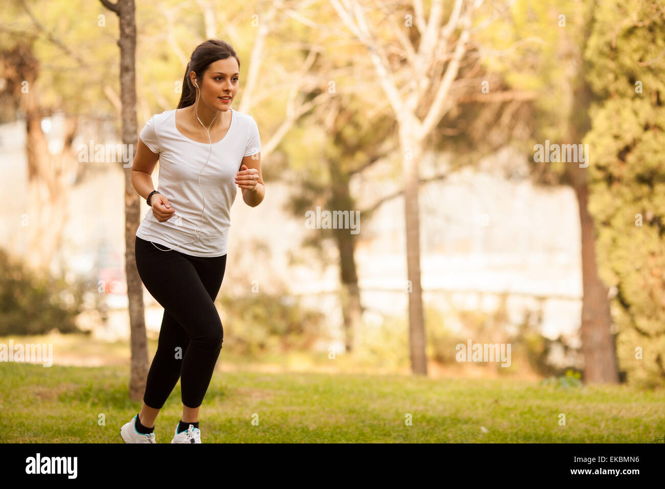 young beautiful woman jogging Stock Photo - Alamy