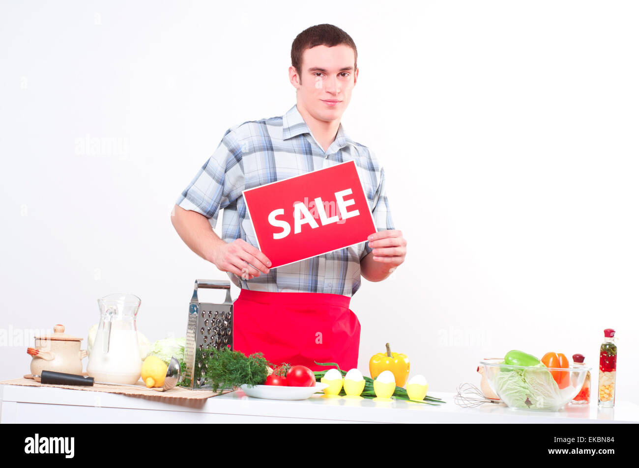 portrait of a young man, hold sale mark Stock Photo - Alamy