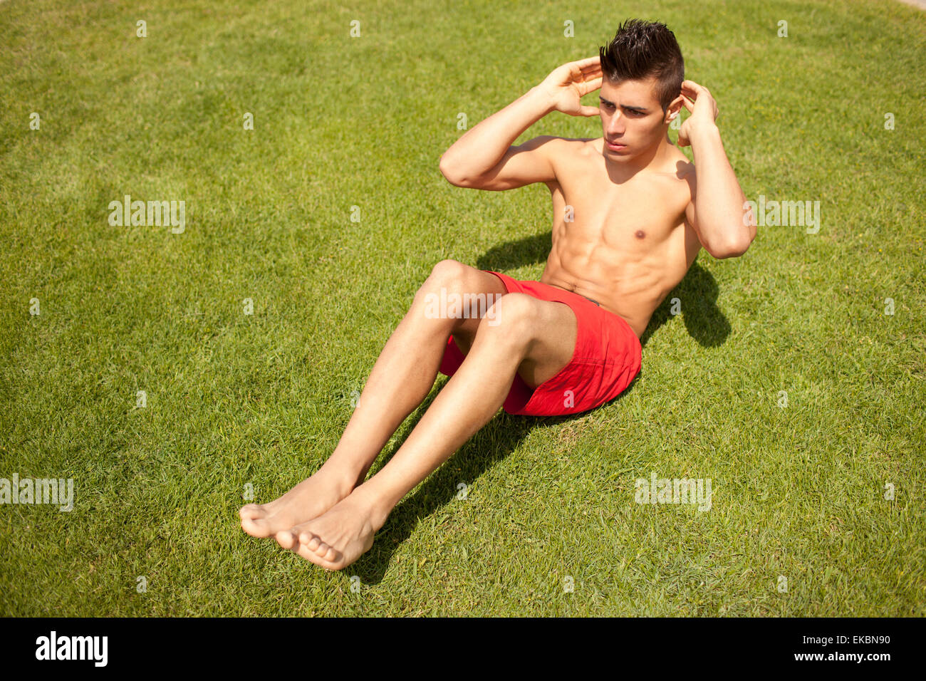 Man abs workout hi-res stock photography and images - Alamy