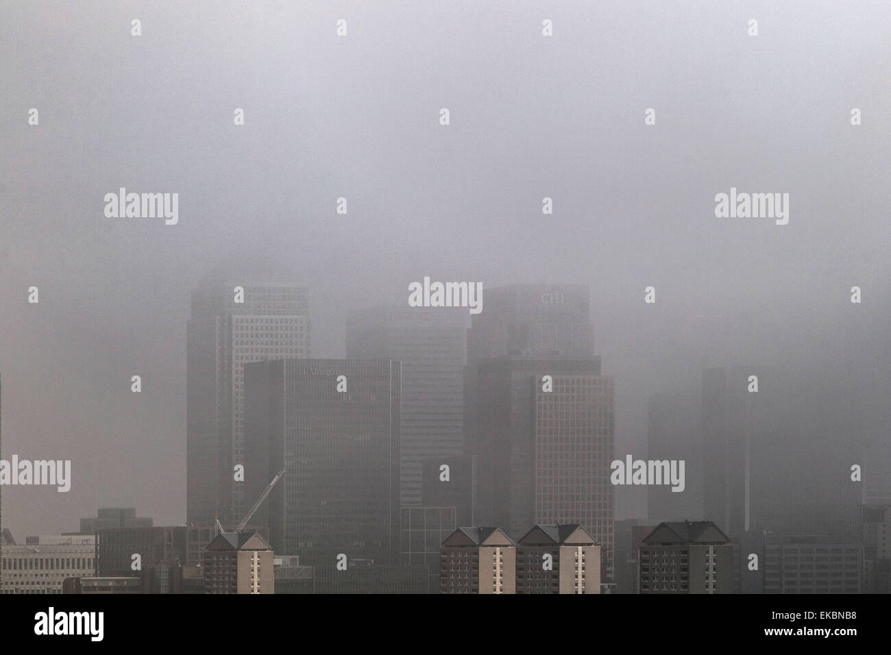 London, UK. 9th April, 2015. Heavy Morning Fog over Canary Wharf ...