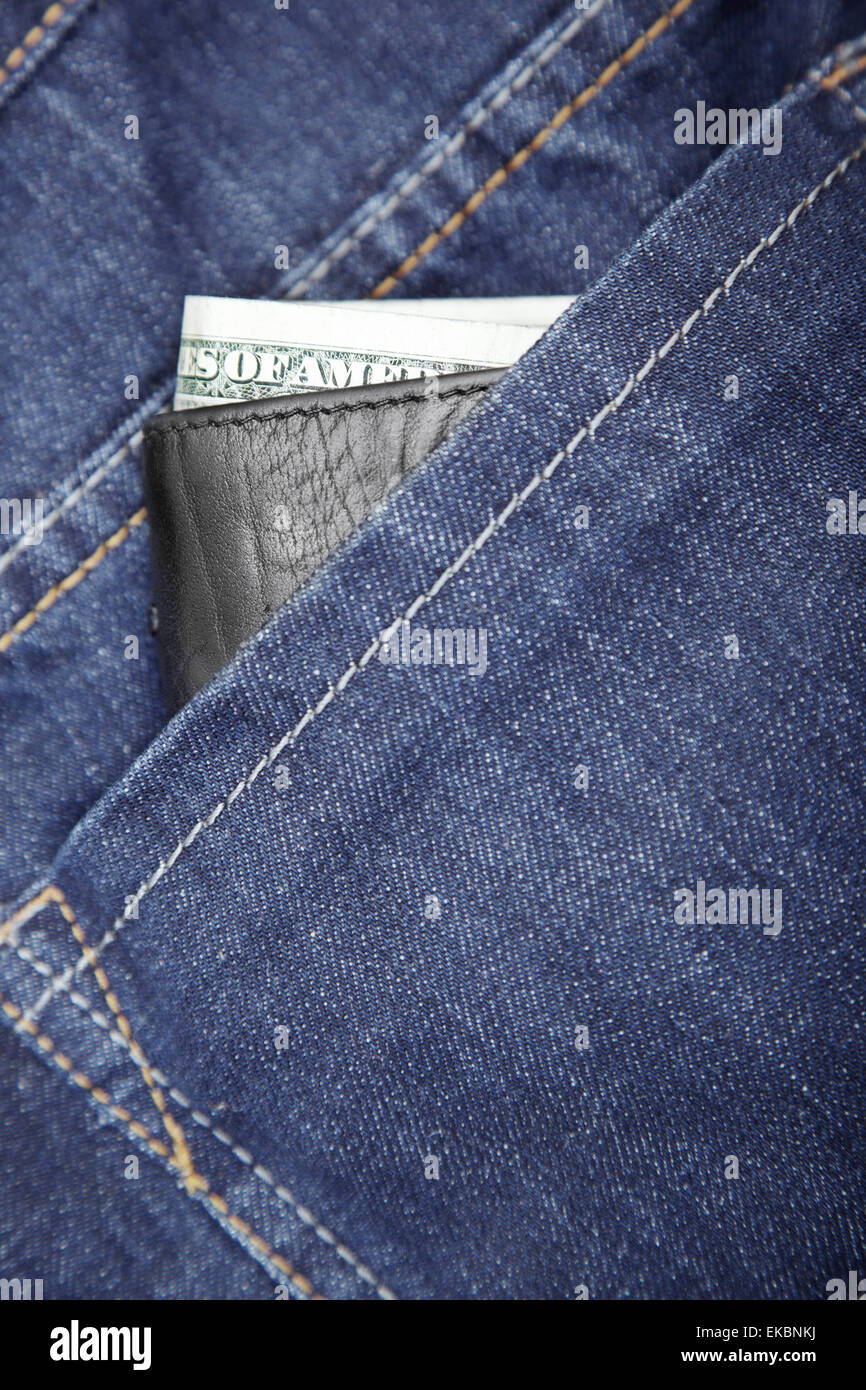 Wallet in jeans Stock Photo - Alamy