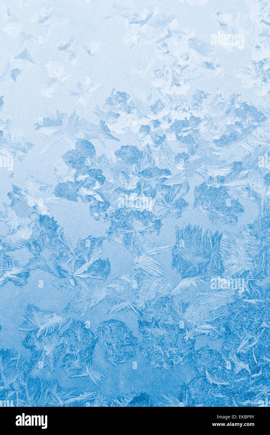 Light blue frozen window glass Stock Photo - Alamy