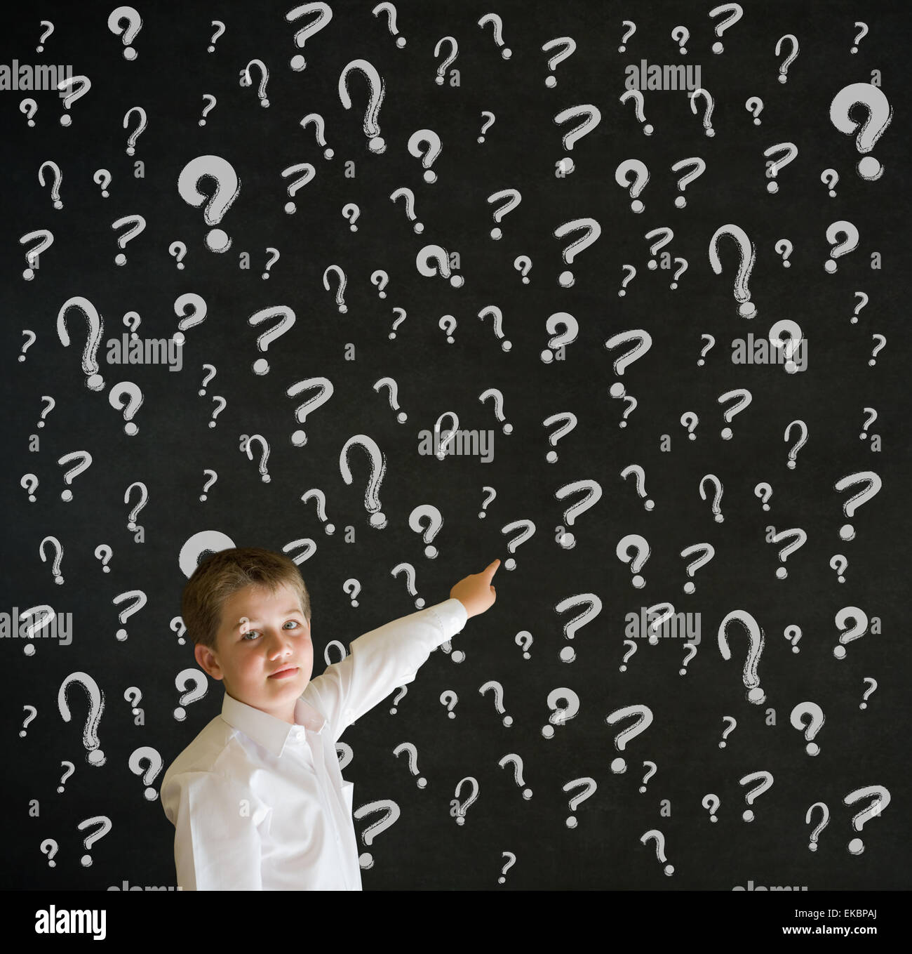 Kid pointing at question marks hi-res stock photography and images - Alamy