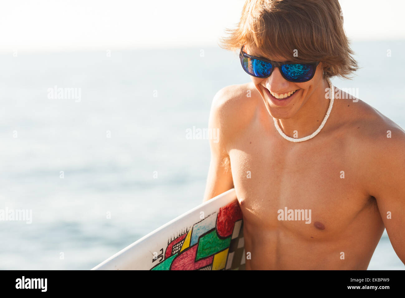 young surfer about to get into the sea Stock Photo - Alamy