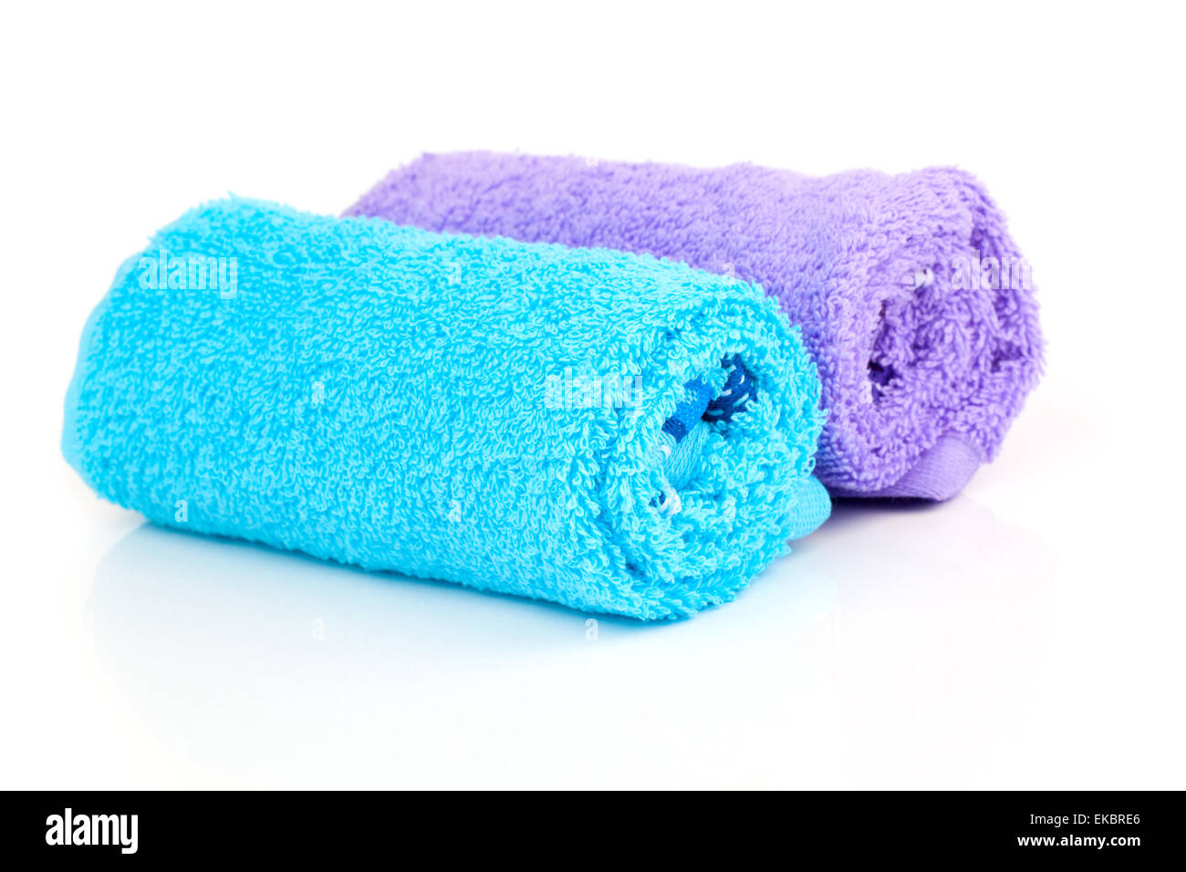 two rolled towel, isolated on white Stock Photo - Alamy