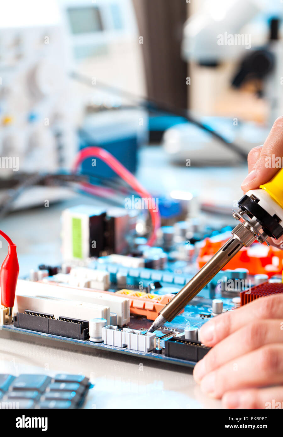 Repaired by soldering a PC board Stock Photo - Alamy