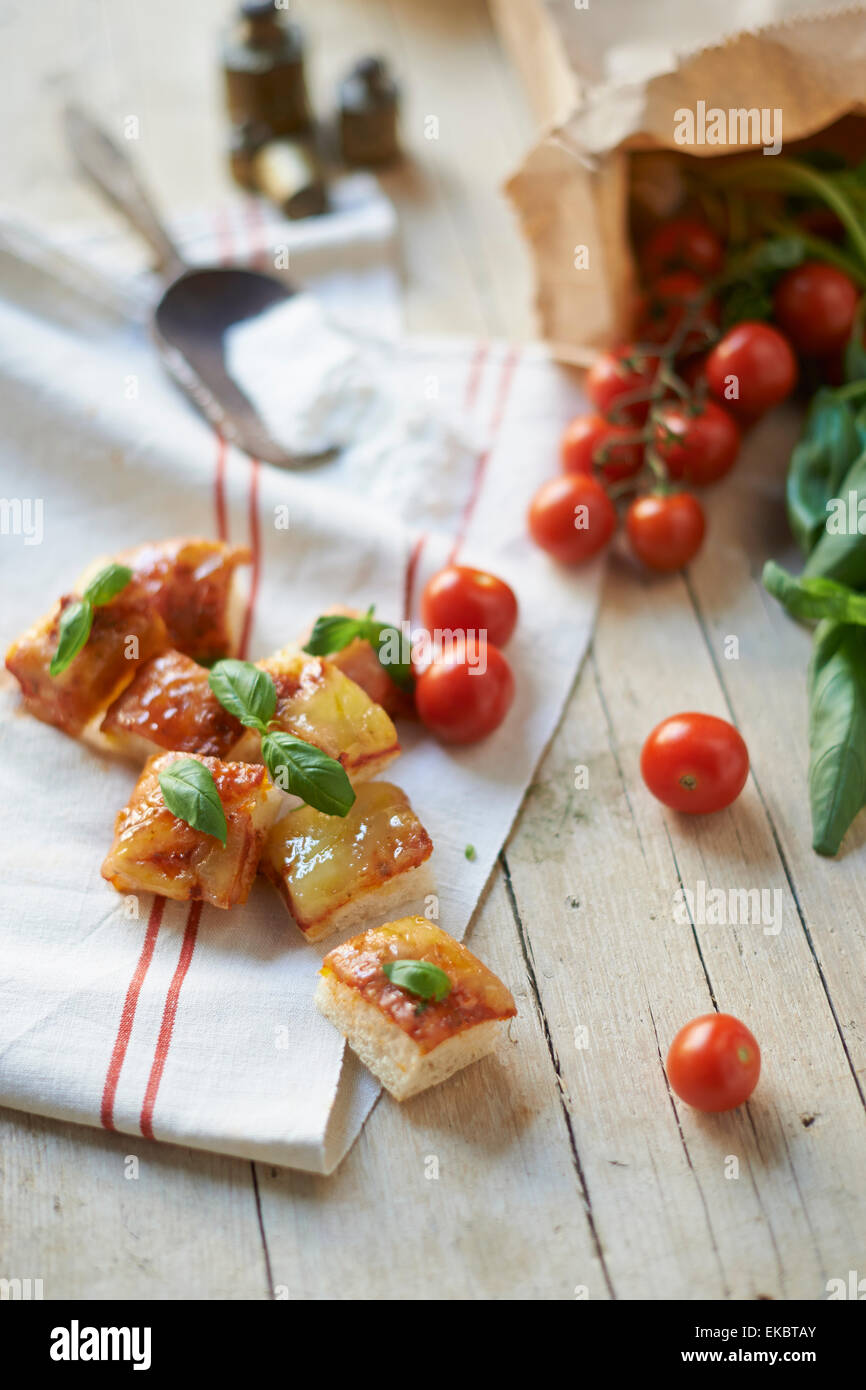 Gluten-free ciabatta squares with vine tomatoes Stock Photo - Alamy