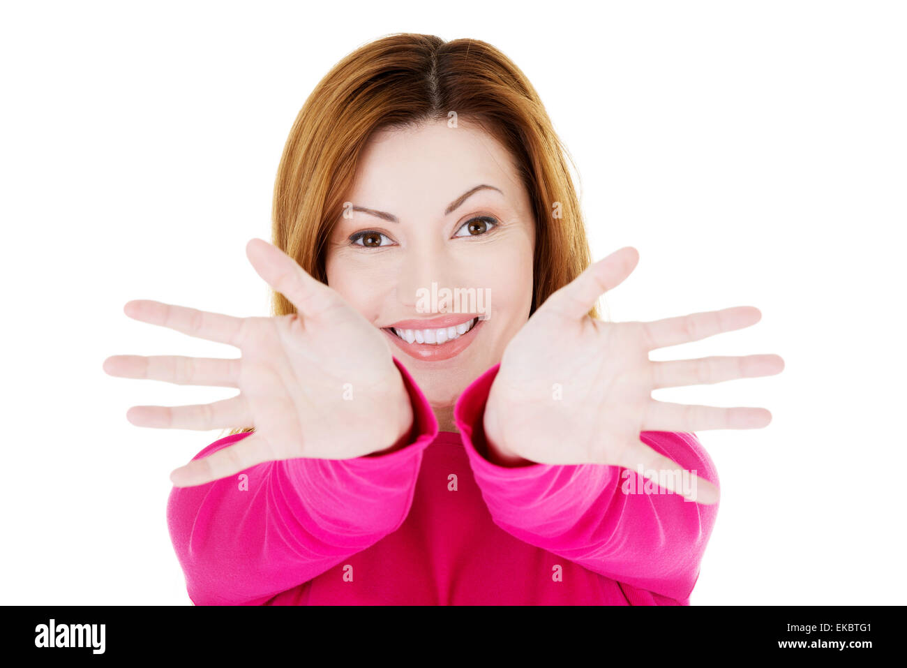Woman pointing hands towards camera hi-res stock photography and images ...
