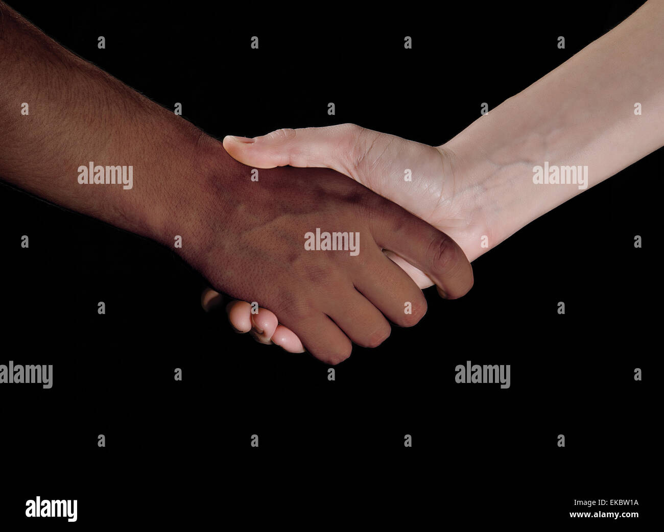 Black hand shaking white hand hi-res stock photography and images - Alamy