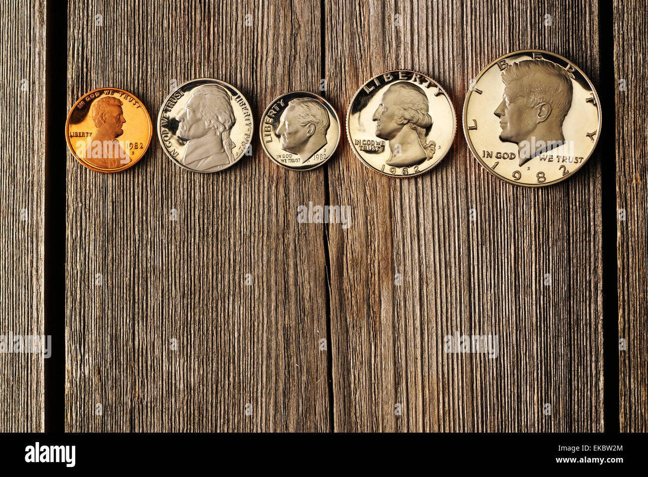 US cent coins over wooden background Stock Photo - Alamy