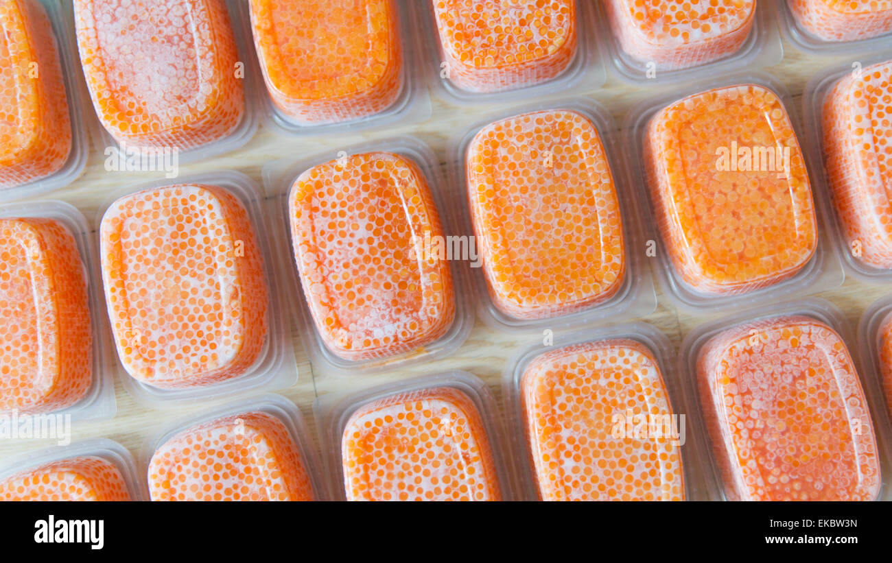 Red caviar frozen in the box Stock Photo - Alamy