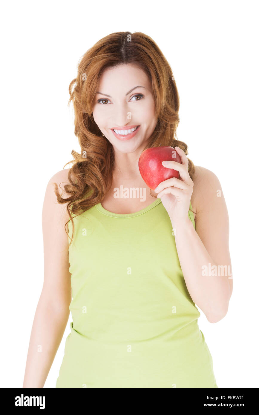 Beautiful woman with red apple Stock Photo - Alamy