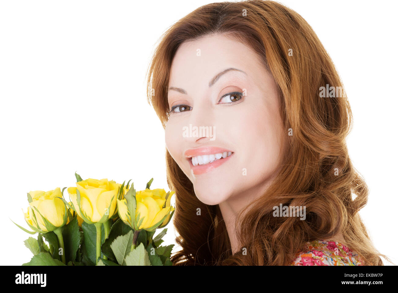Happy woman with yellow roses Stock Photo - Alamy
