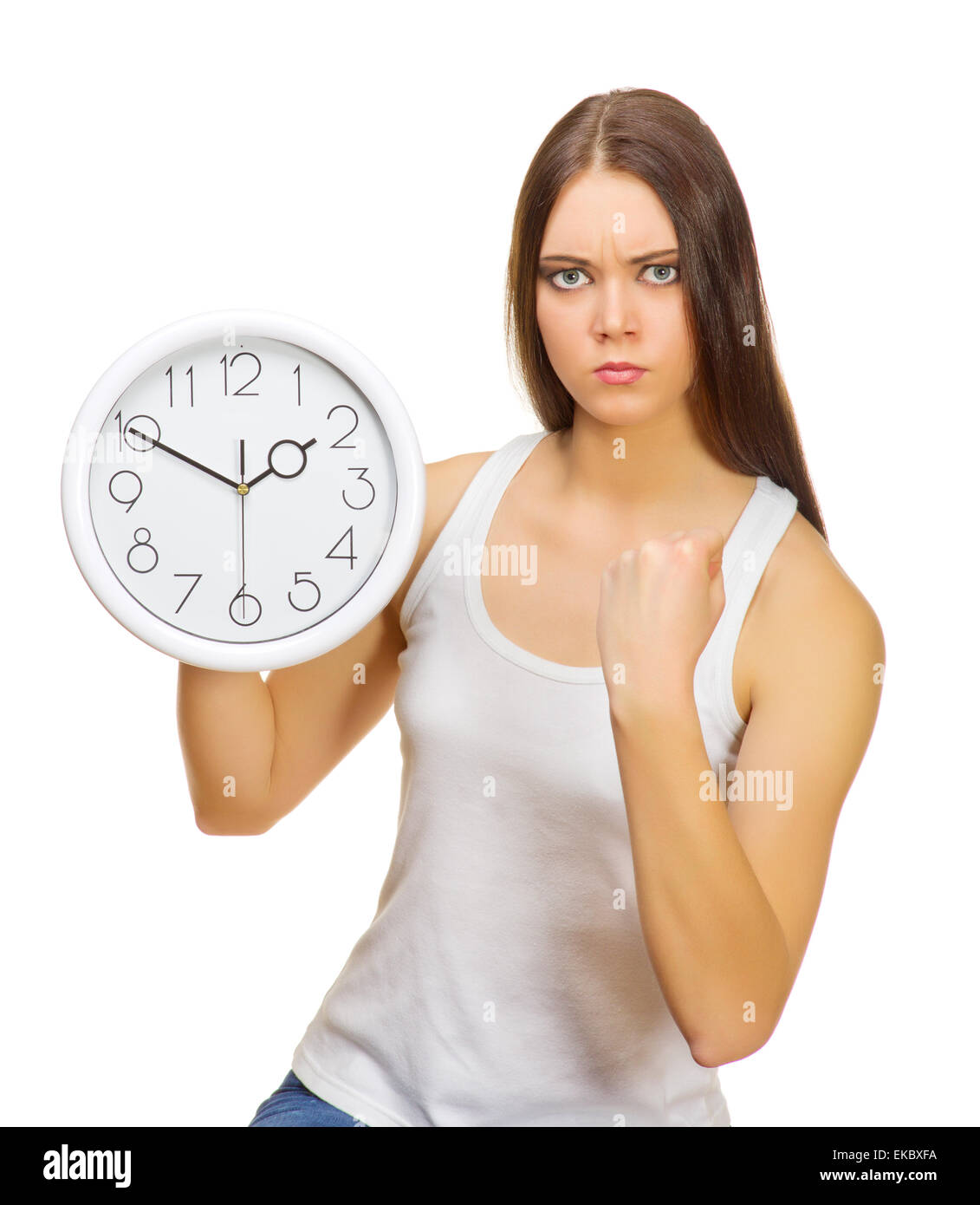 Young angry girl with clocks Stock Photo - Alamy