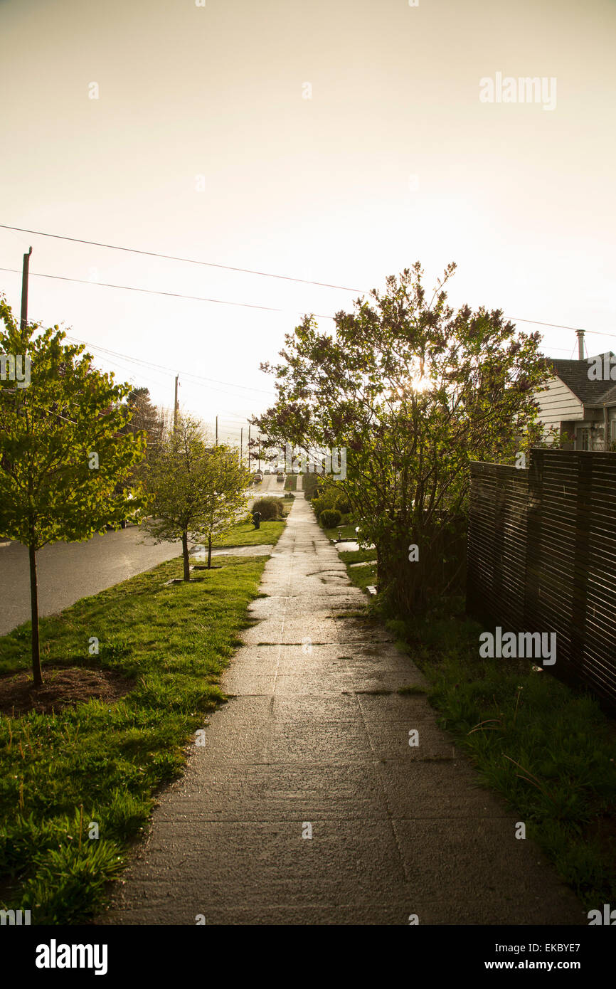 Pedestrian path along residential street Stock Photo - Alamy