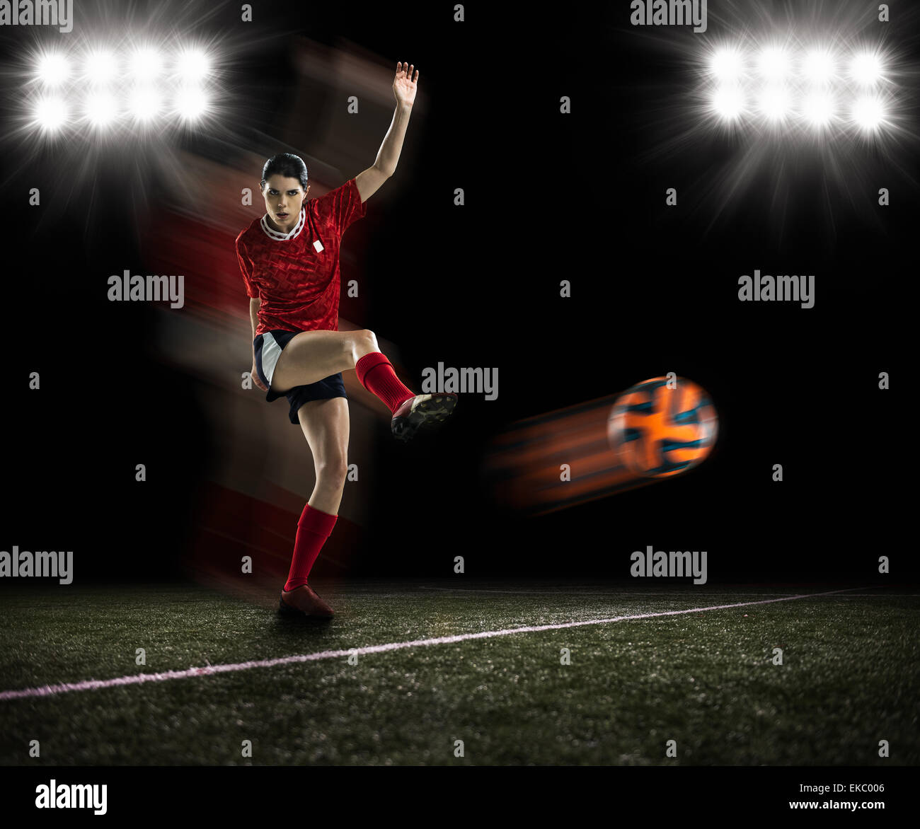 Footballer kicking ball hi-res stock photography and images - Alamy