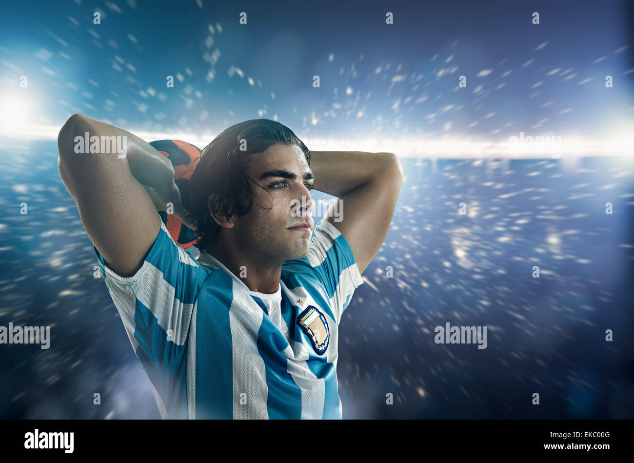 Footballer throwing in Stock Photo - Alamy