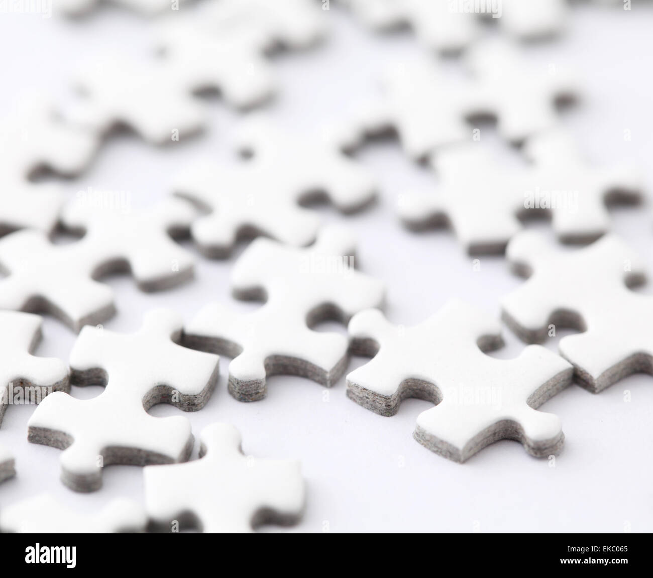 white jigsaw puzzle Stock Photo - Alamy