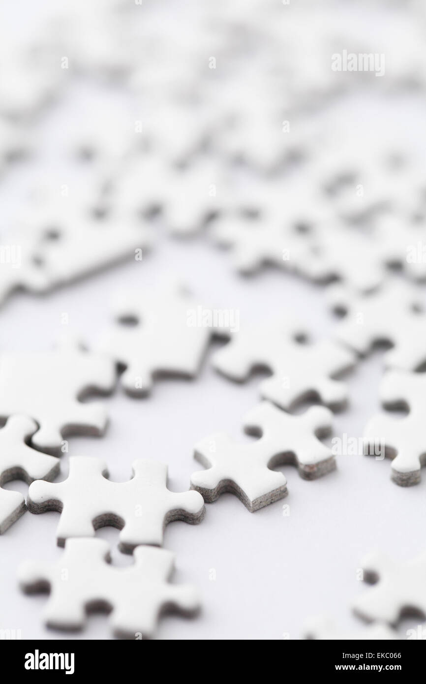 white jigsaw puzzle Stock Photo - Alamy