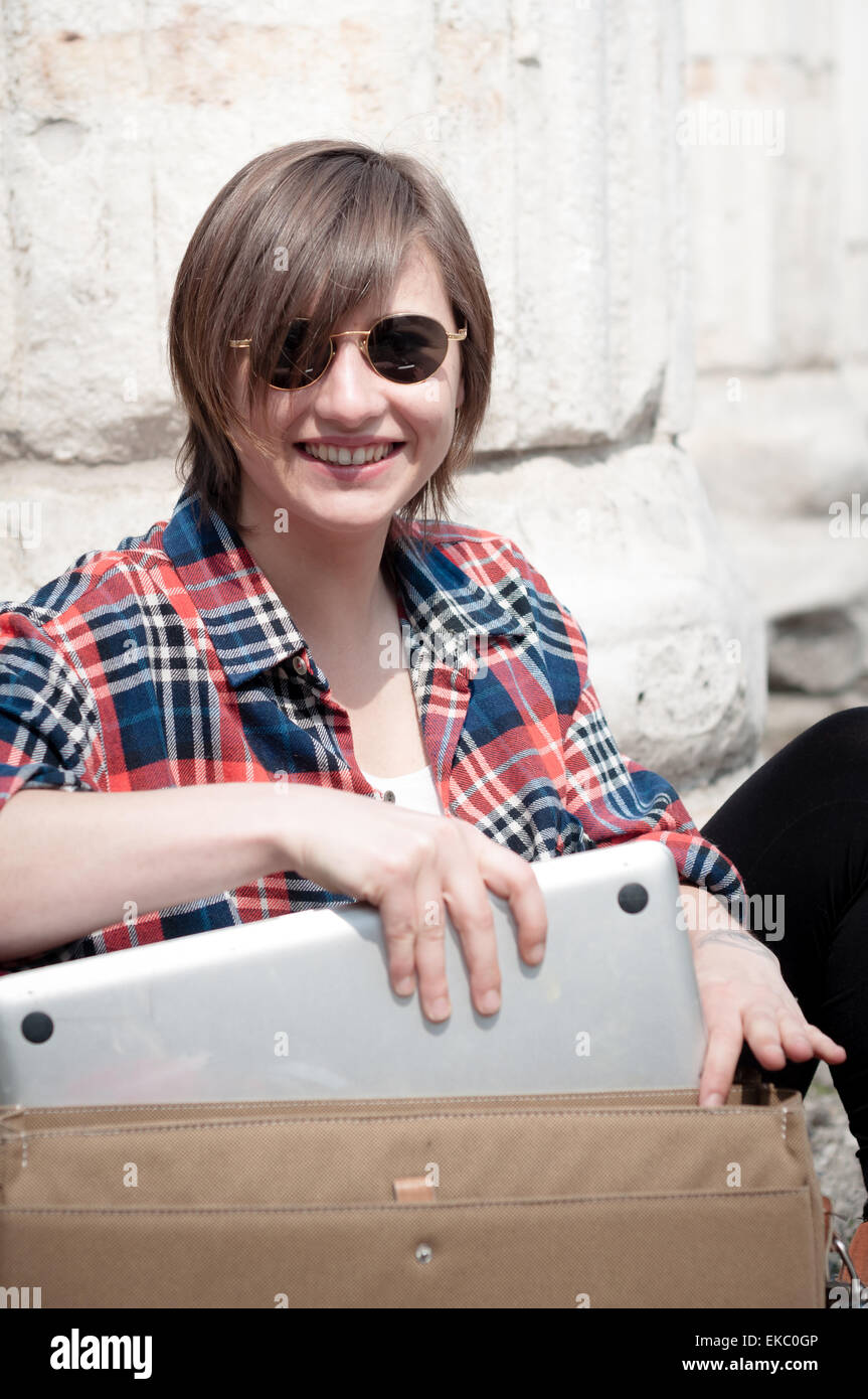 young woman using notebook Stock Photo - Alamy