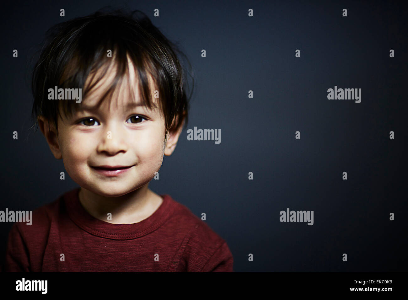 Boy smiling towards camera Stock Photo - Alamy