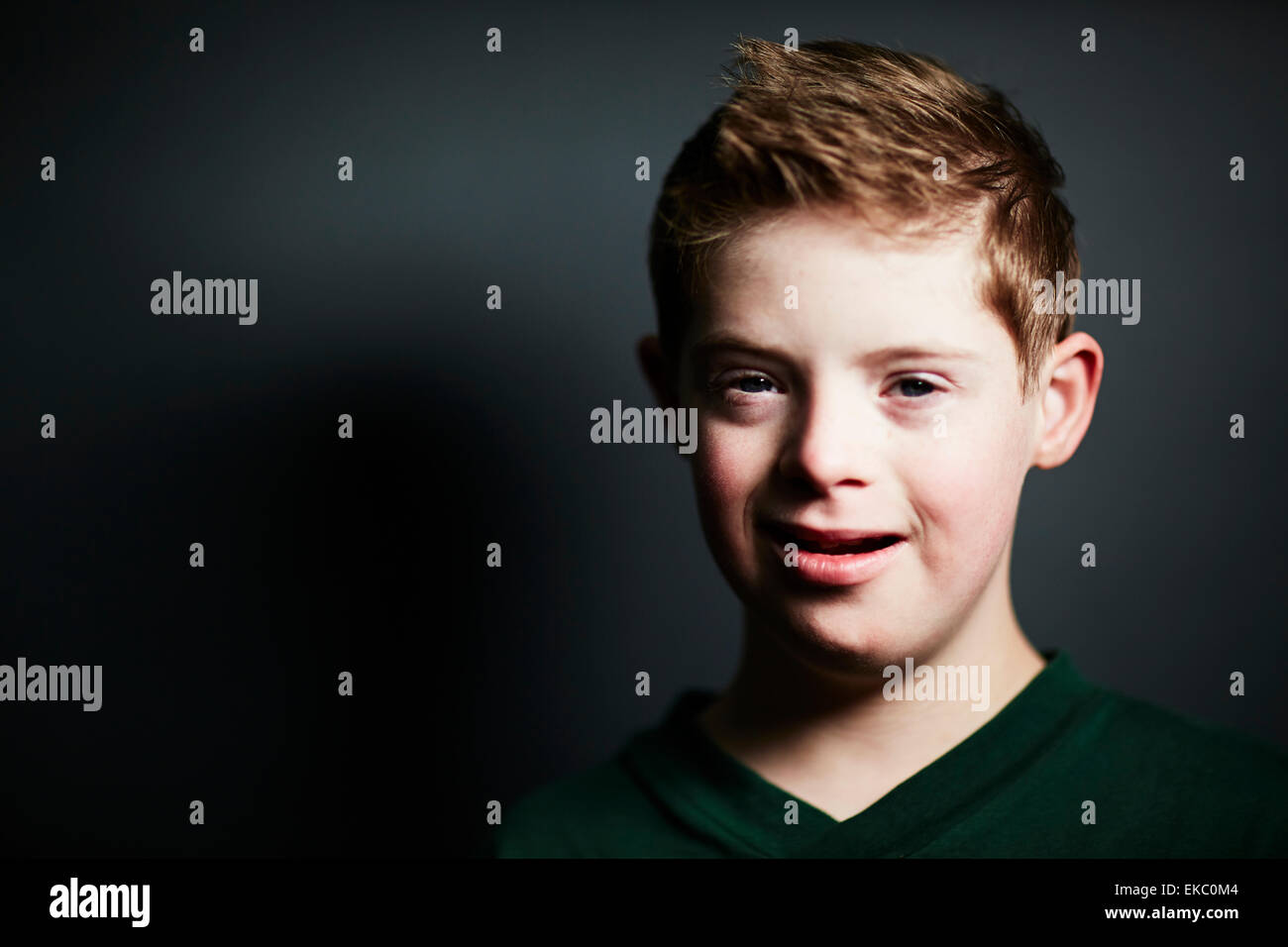 Boy looking at camera Stock Photo - Alamy