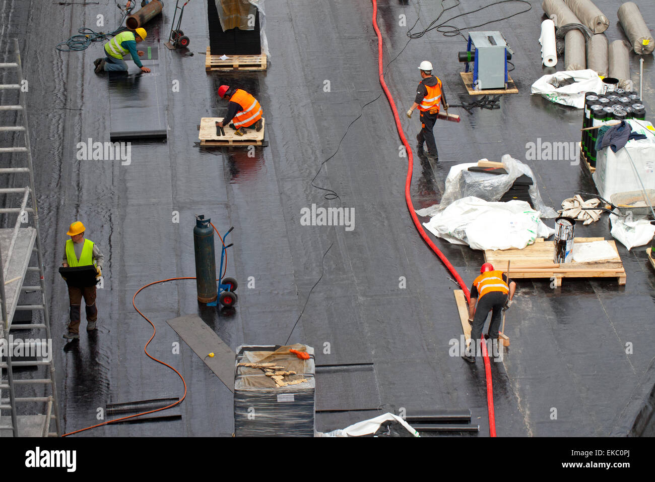 Workers on basement of new building Stock Photo - Alamy
