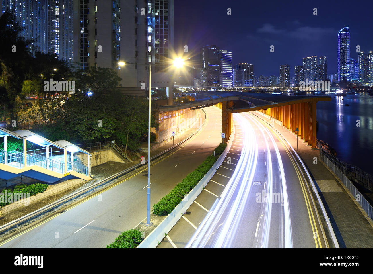 Road in city at night Stock Photo - Alamy